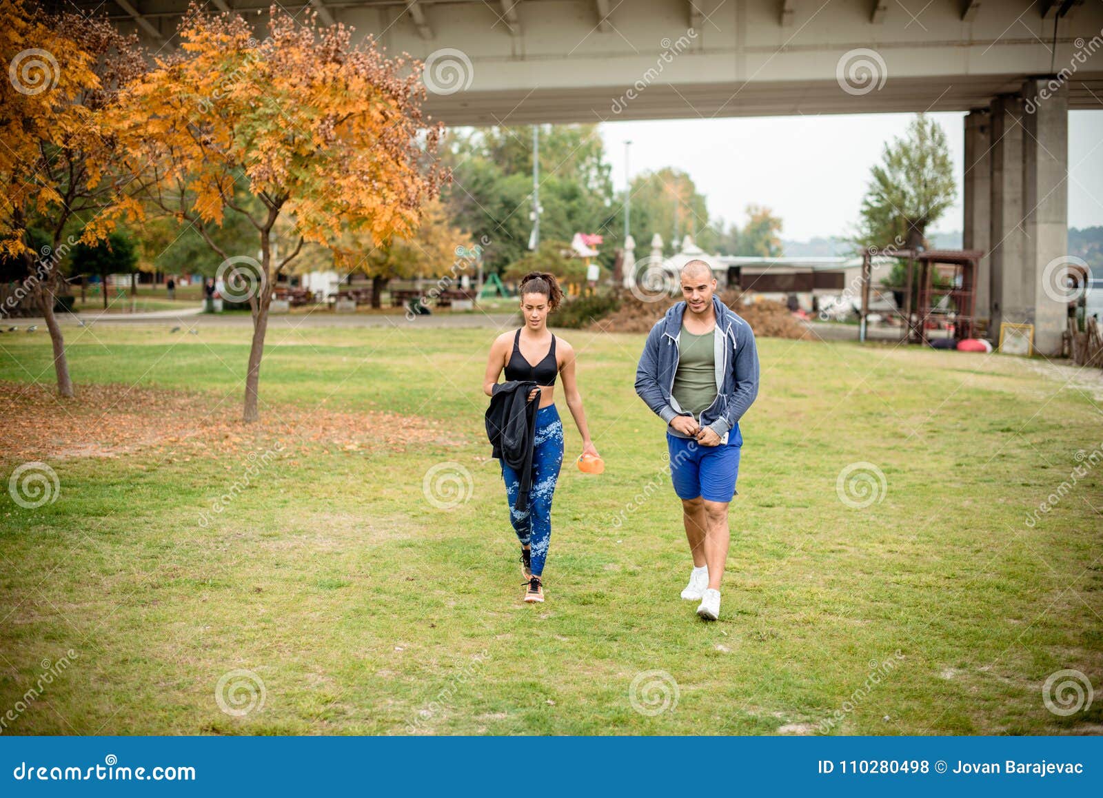 Two athletes in park stock photo. Image of activities - 110280498