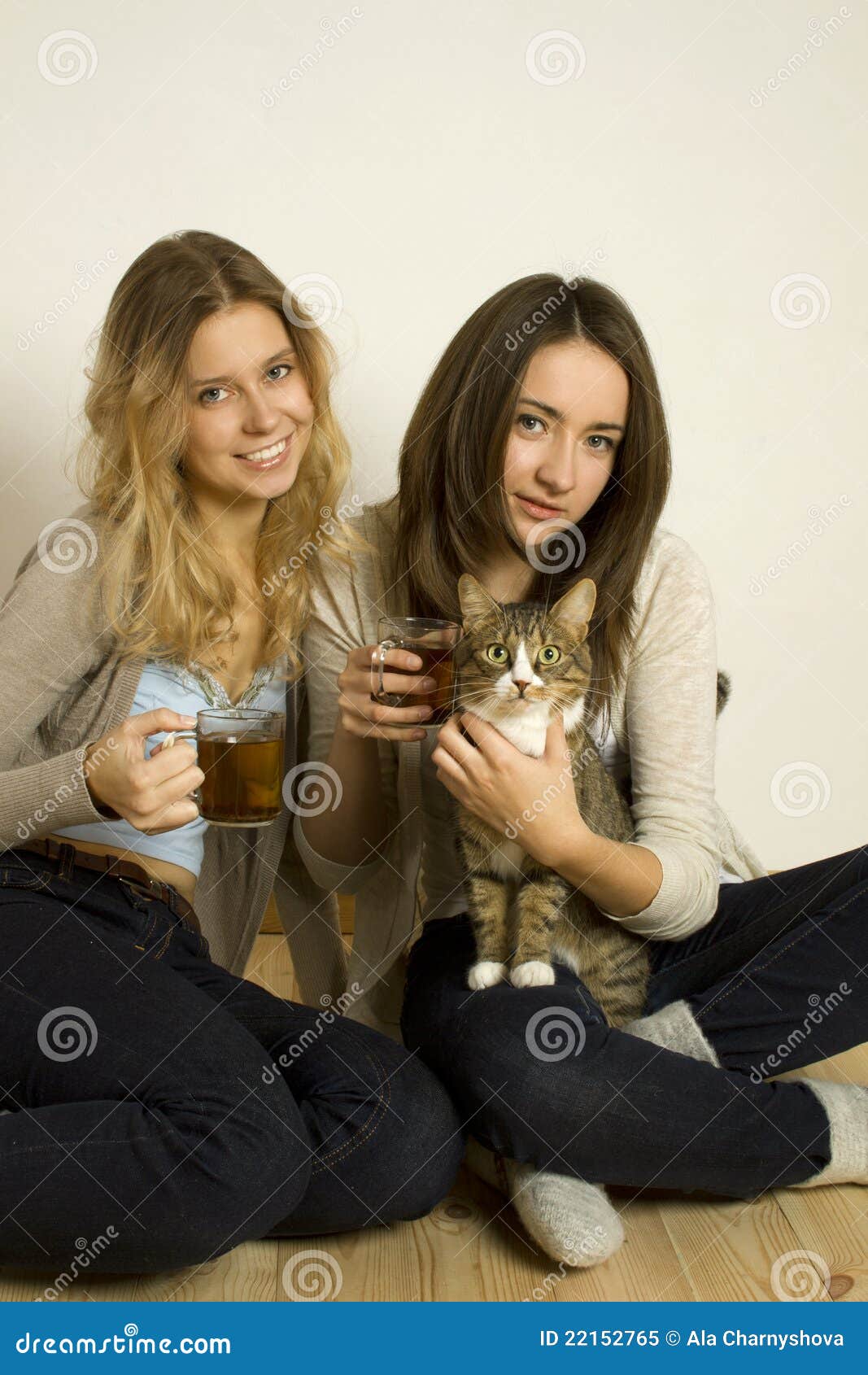 Two Attractive Friends Drinking Tea Stock Image - Image of relax, hair ...