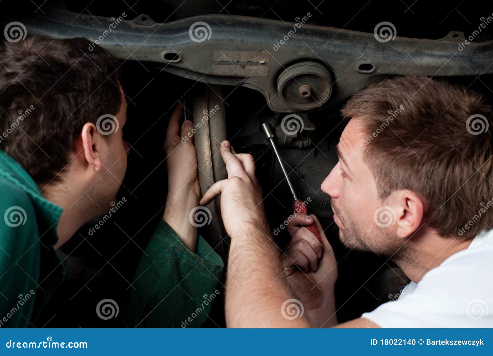 Two Auto Mechanics Repair Car in Auto Service Stock Photo - Image of ...
