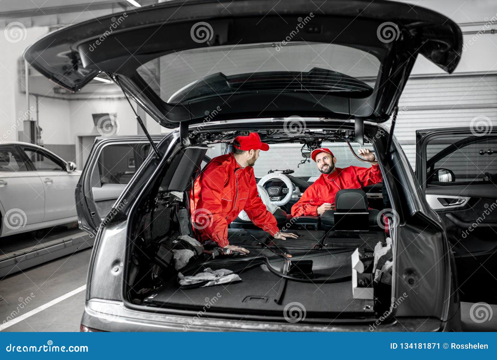 Car Service Workers Disassembling Car Interior Stock Image - Image of ...