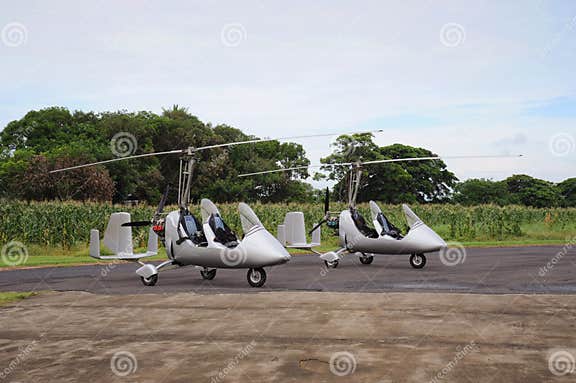 Two autogyros stock image. Image of daytime, concrete - 11759777