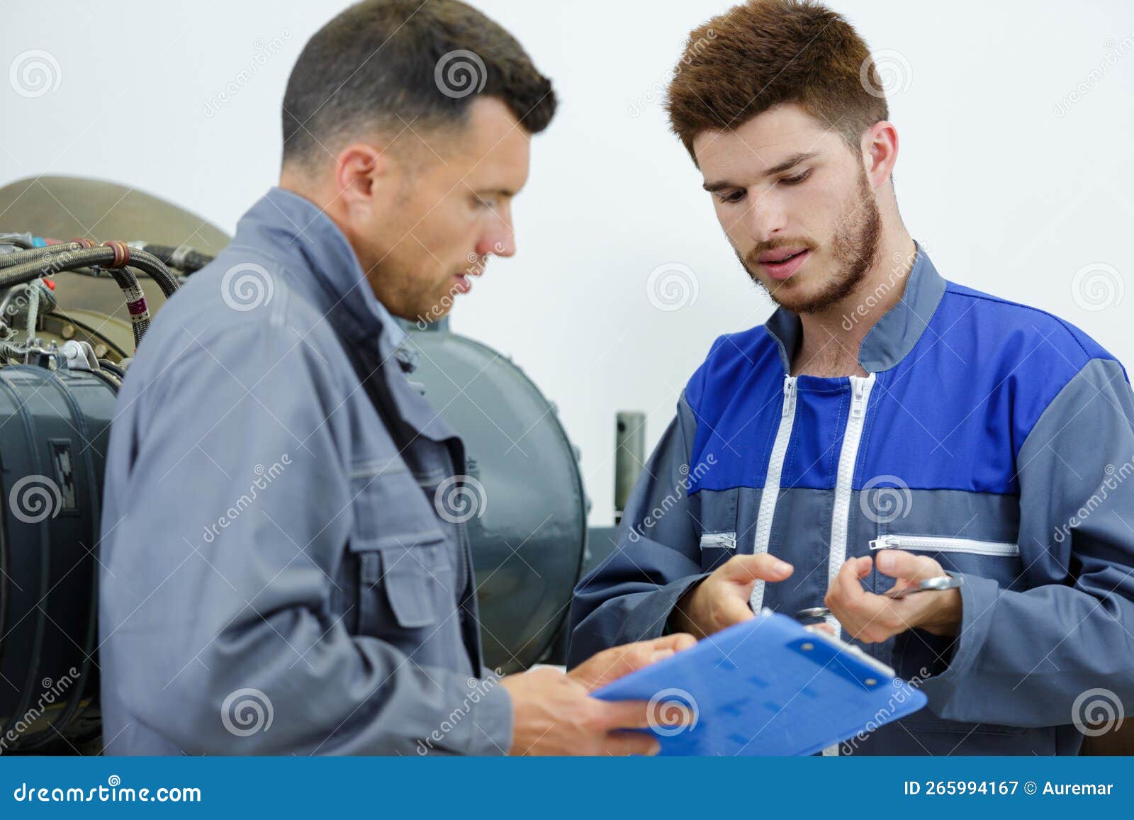 Two Automobile Mechanics Checking Checklist Stock Image - Image of ...