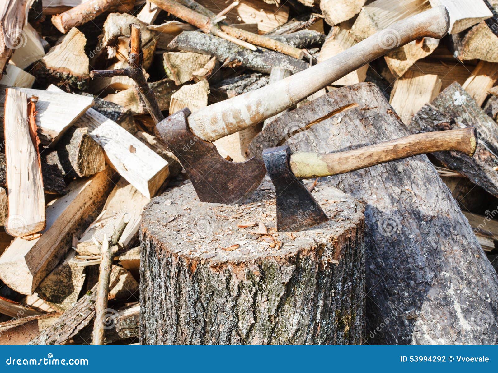 Two Axe on Rustic Courtyard Stock Photo - Image of backyard, deck: 53994292