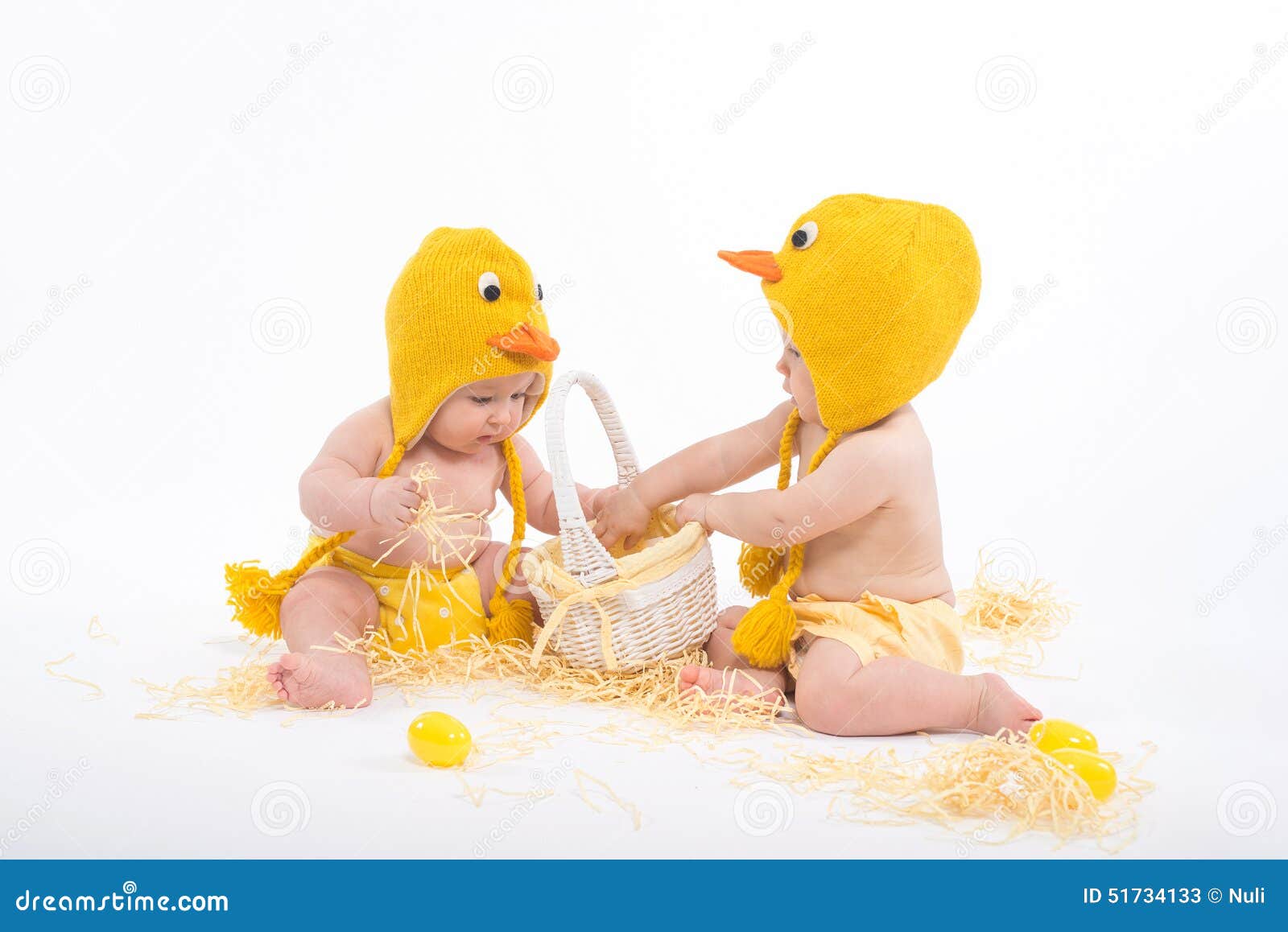 Two Babies in Chicken Costumes with White Basket and Hay Stock Image ...