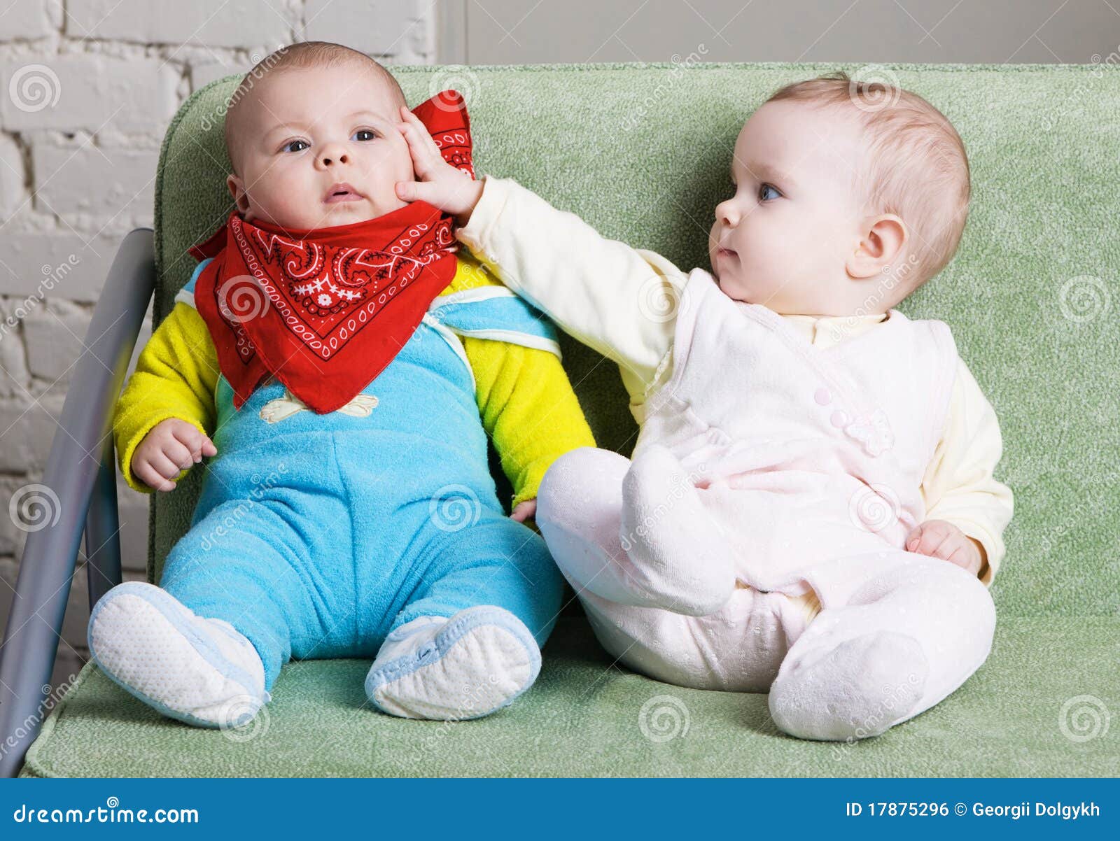 Two Babies Sitting on a Sofa Together Stock Photo - Image of newborn ...