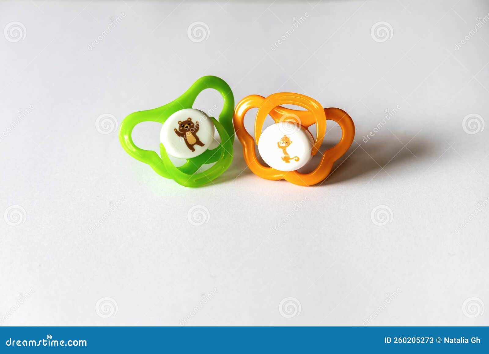 Two Baby Pacifiers on a White Background. Stock Image - Image of little ...