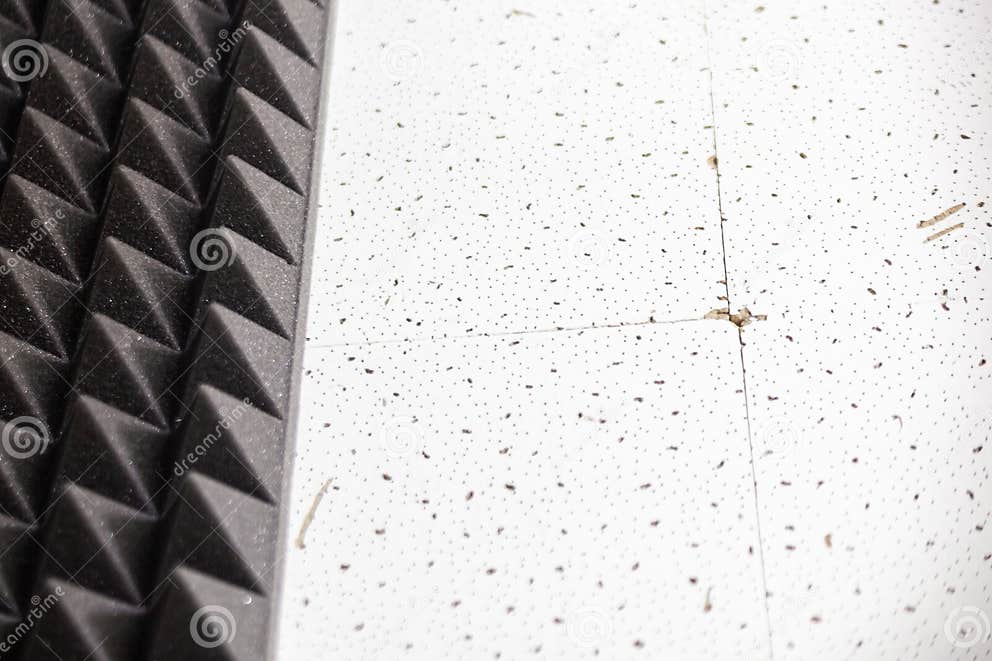 Two Backgrounds on One Wall. Soundproofing and Plain White Wall in a ...