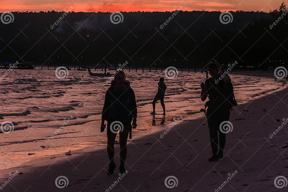 Two Backpacker Walking on the Beach at Sunset Editorial Image - Image ...