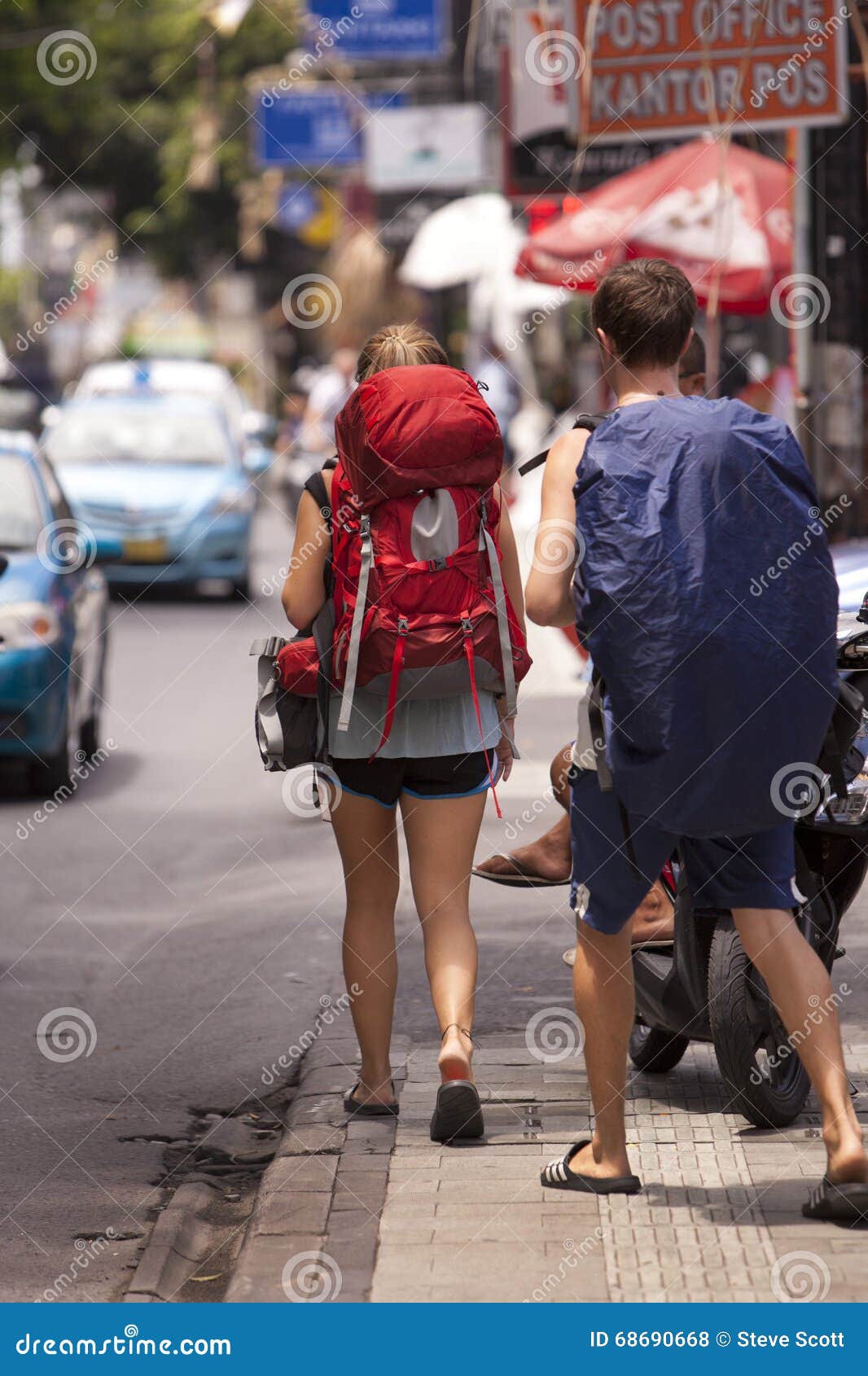 Two backpackers. editorial stock photo. Image of independent - 68690668