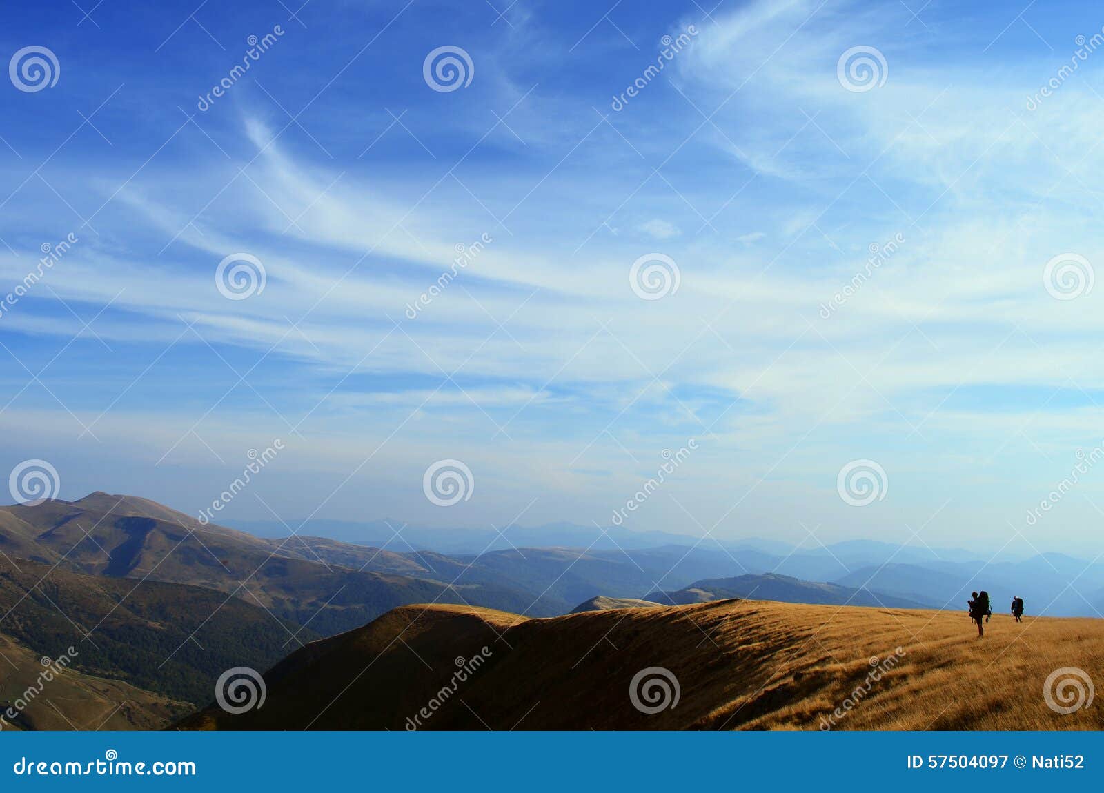 Two Backpackers Hiking in Mountains Stock Image - Image of hikers ...