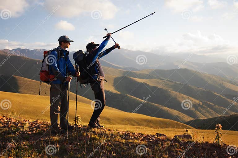 Two Backpackers in the Mountain Stock Image - Image of sunset ...