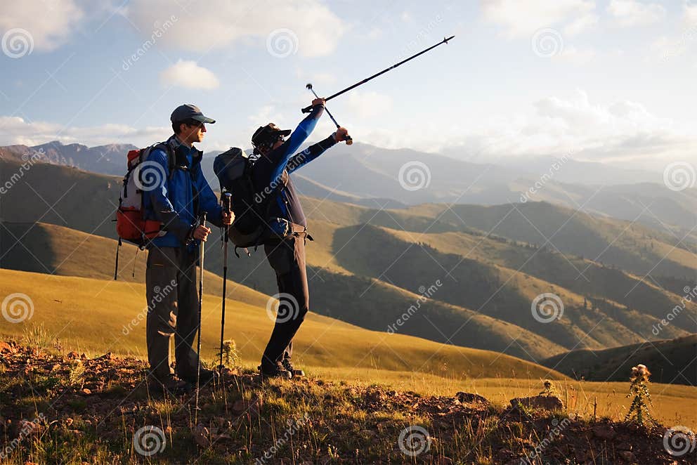 Two Backpackers in the Mountain Stock Image - Image of sunset ...