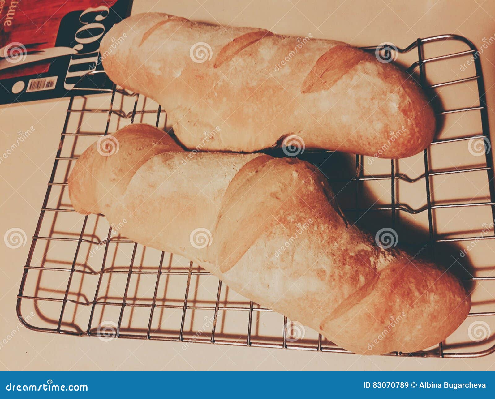 Two Baguettes on a Baking Grid Stock Image - Image of grid, retro: 83070789