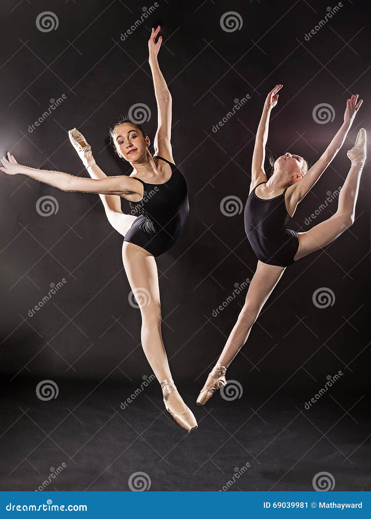Two Ballerinas Jumping in the Air Stock Image - Image of ballerina ...