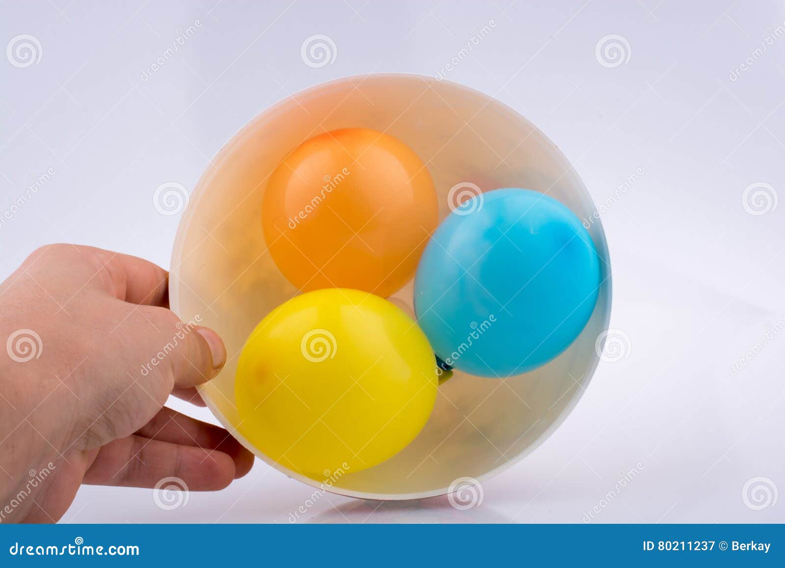 Two balloons in a bowl stock image. Image of isolated - 80211237