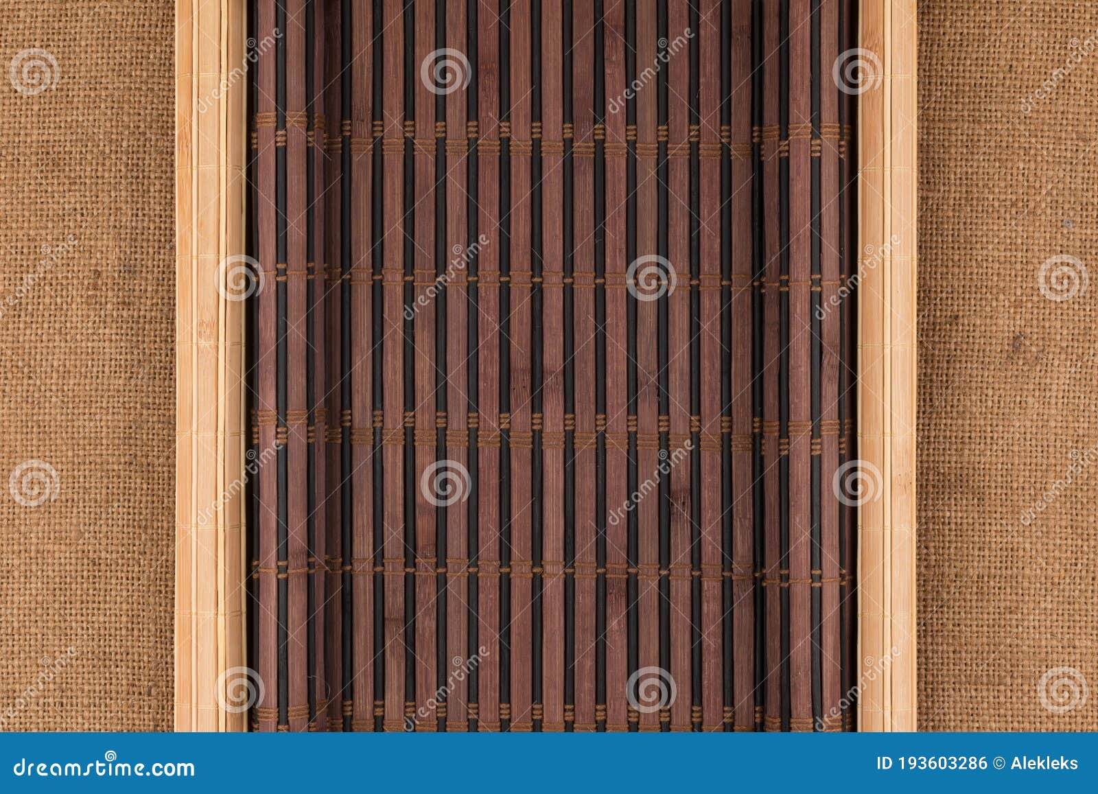 Two Bamboo Mat with Curled Edges Lie on Sacking Stock Photo - Image of ...