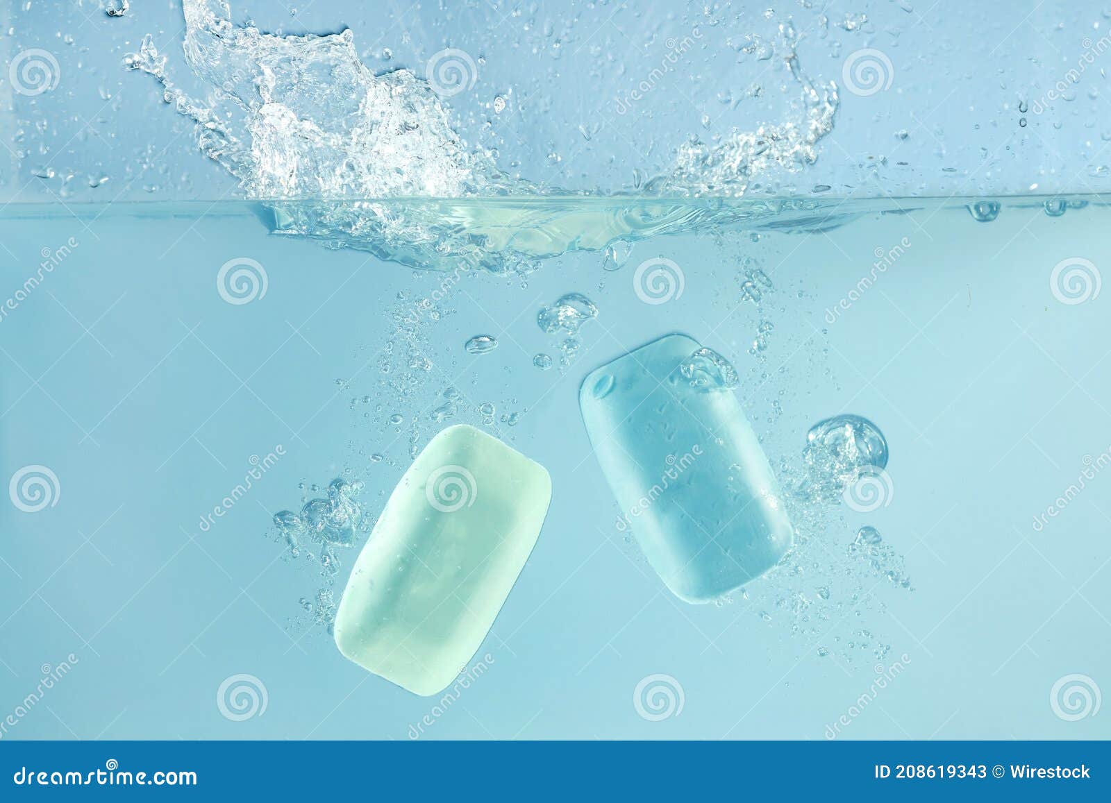 Two Bars of Soap Dropped in the Water Creating a Splash - Beating ...