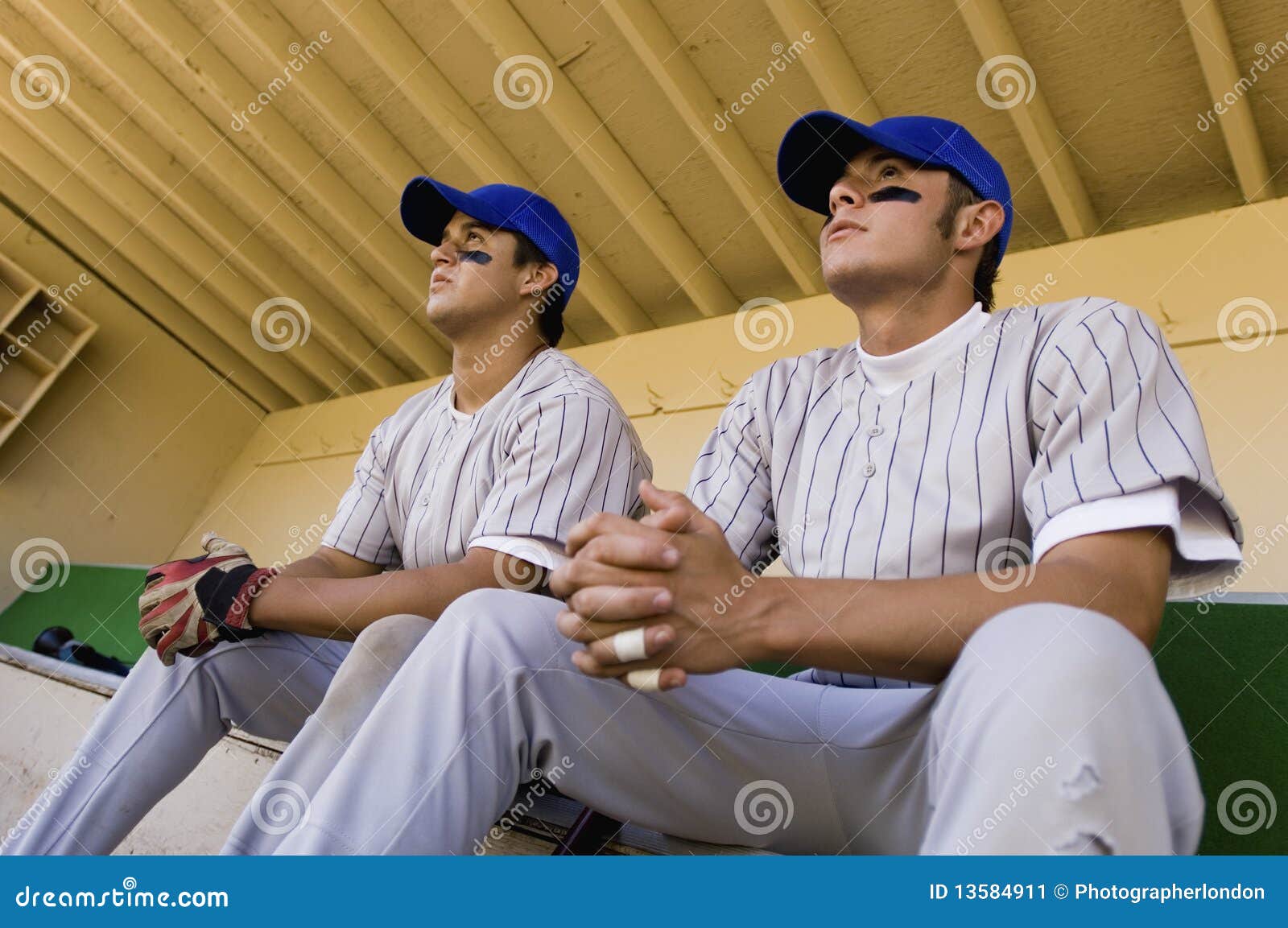 Two Baseball Team-mates Sitting in Dugout Stock Image - Image of view ...