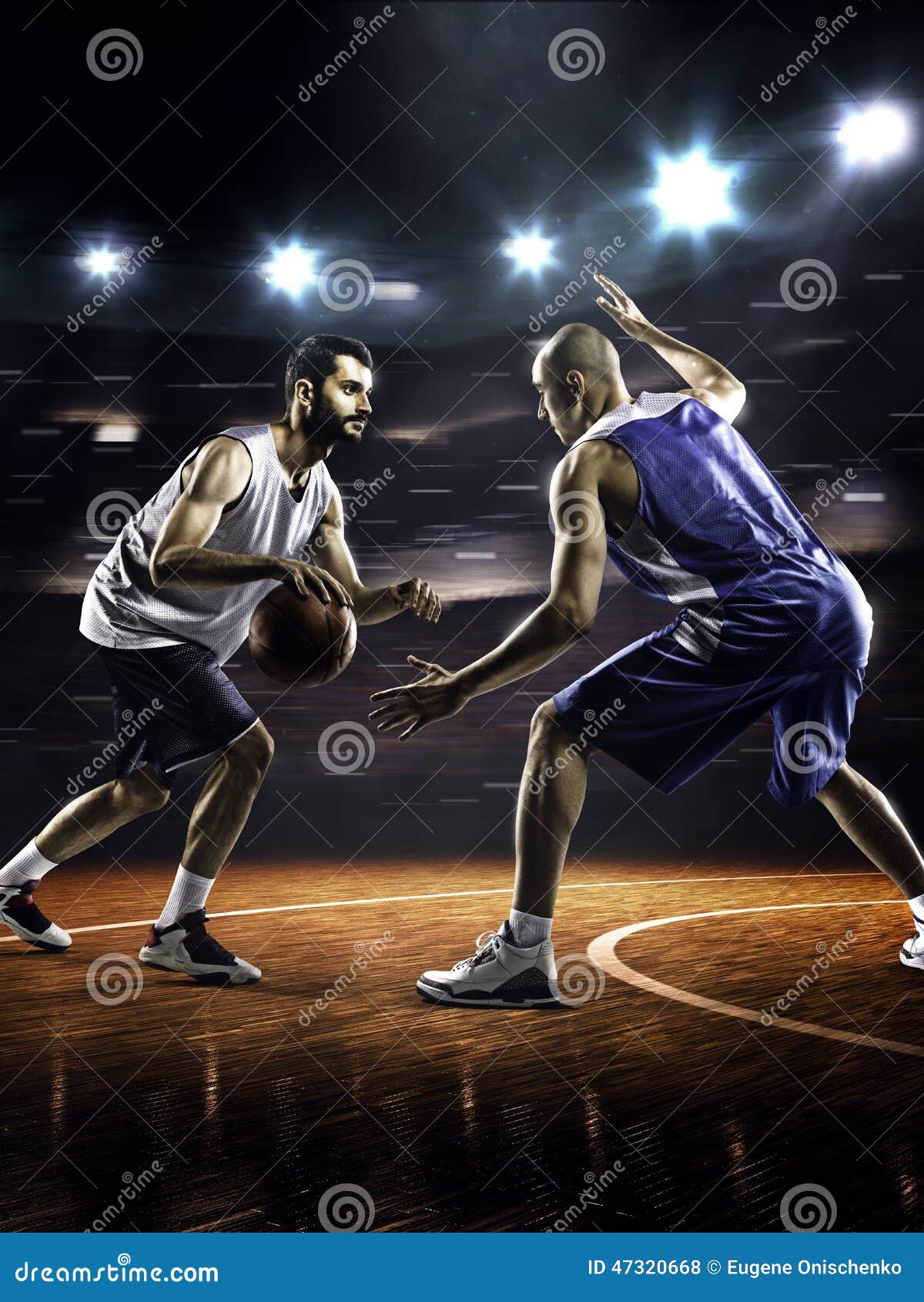 Two Basketball Players in Action Stock Photo - Image of hoop, adult ...