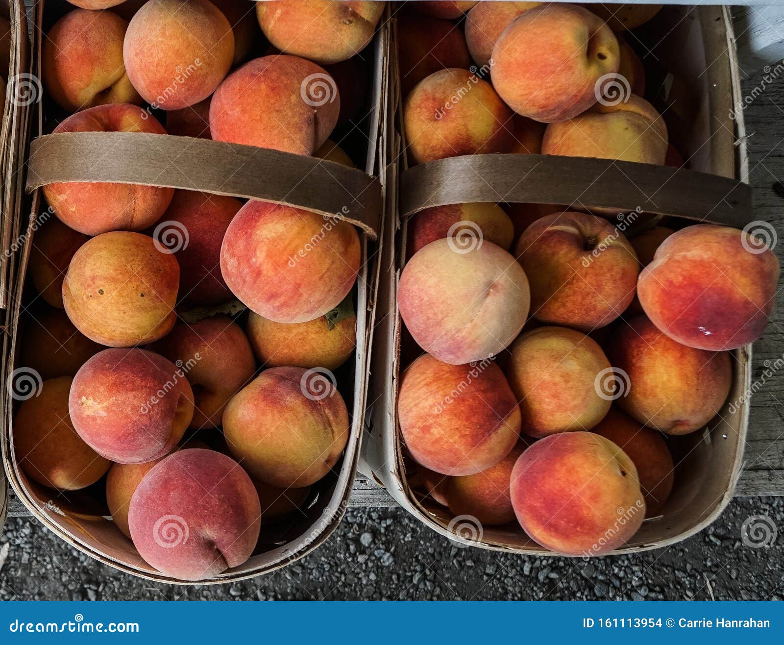 Baskets of Peaches stock photo. Image of orange, handles - 161113954