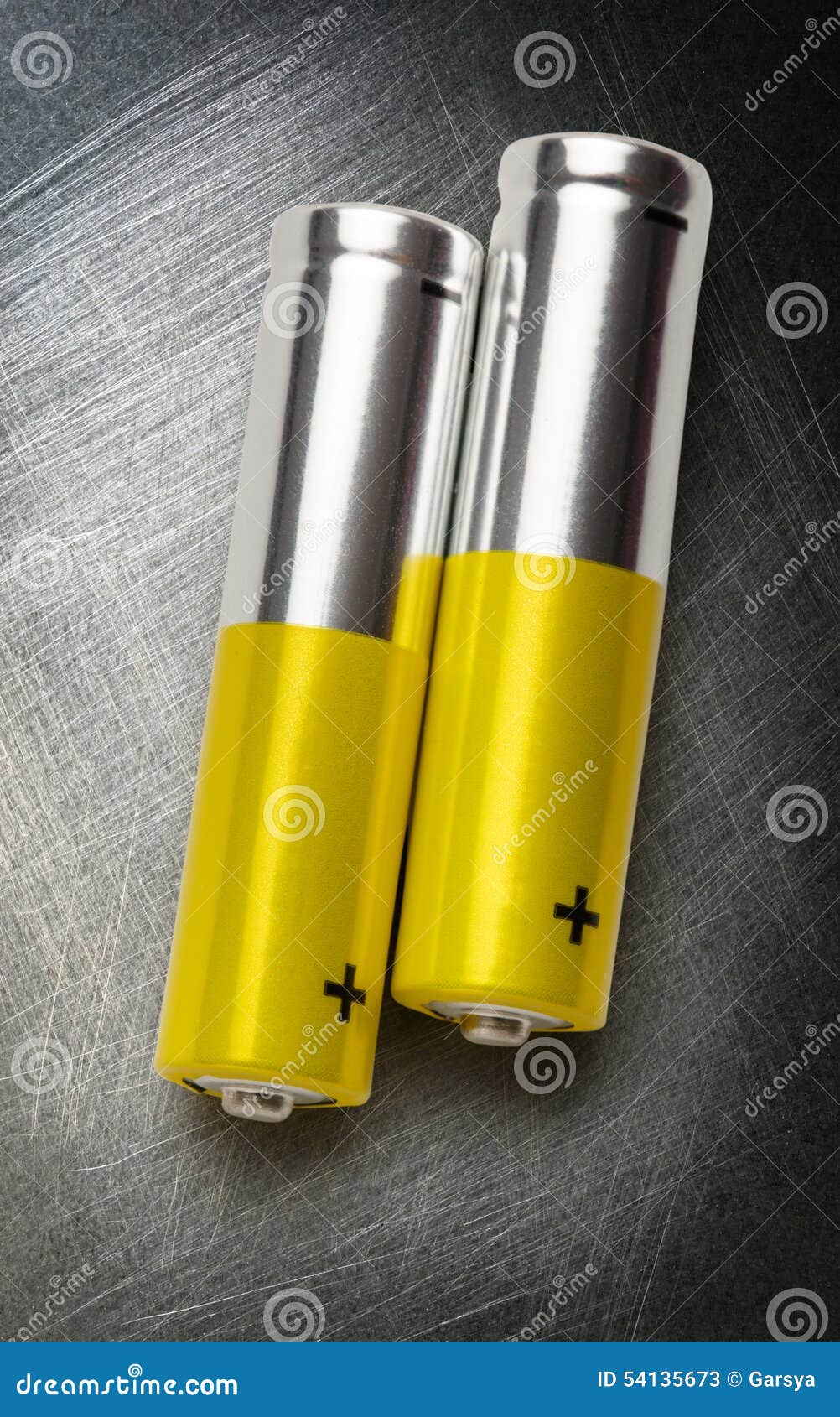 Two batteries stock image. Image of pattern, yellow, energy - 54135673