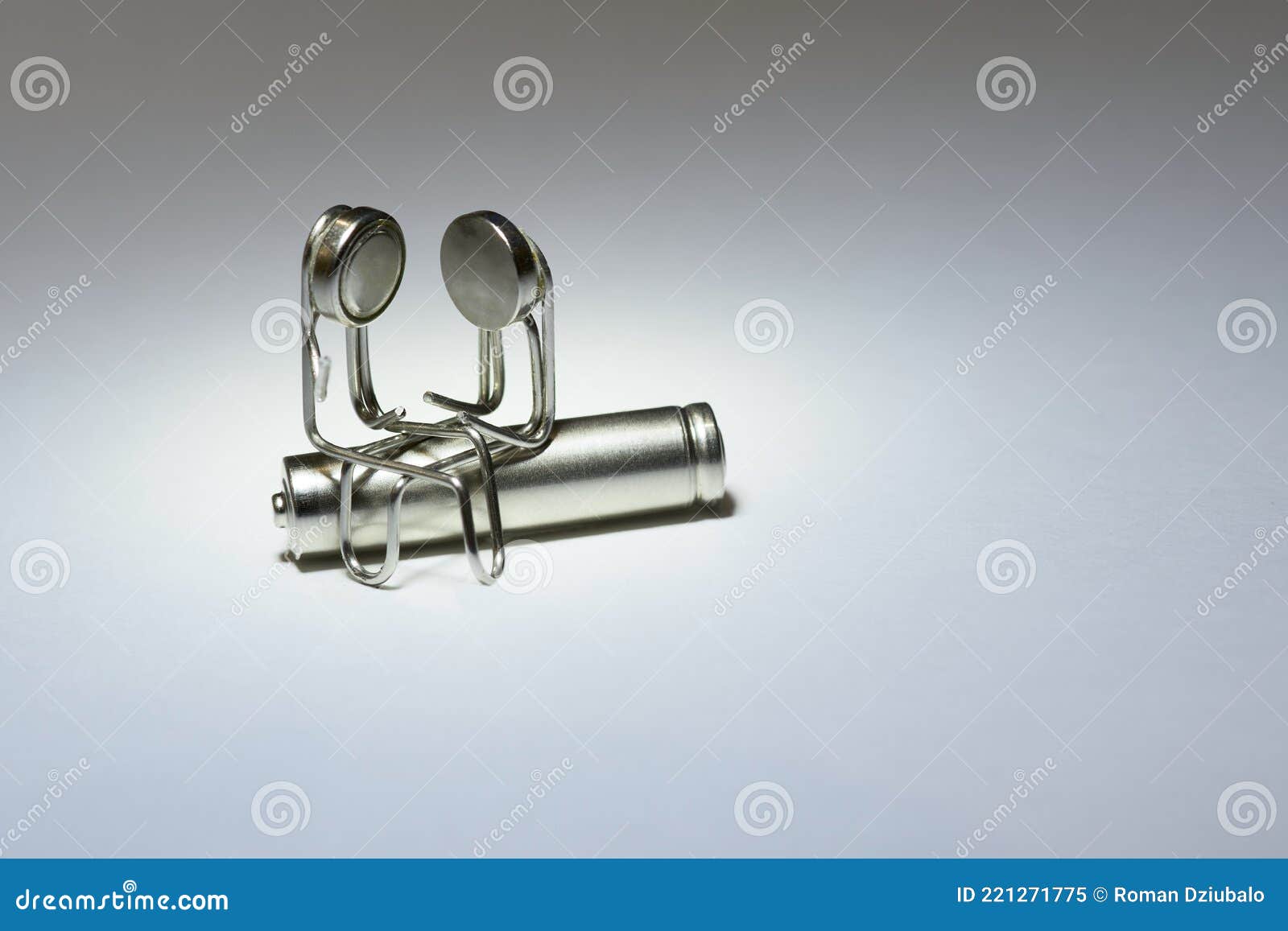 Batteries In The Form Of Recycling On A Green Background. Battery ...