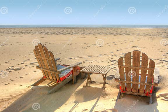 Two Beach Chairs Sitting in the Sand Stock Image - Image of beauty ...