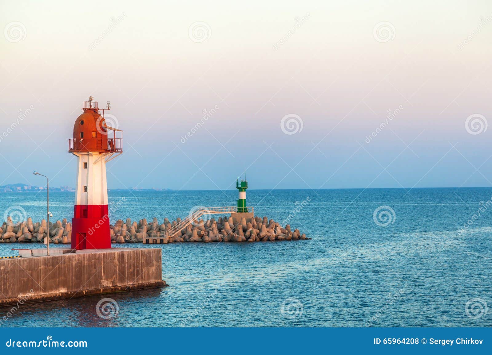 Two beacons stand on pier stock photo. Image of blue - 65964208