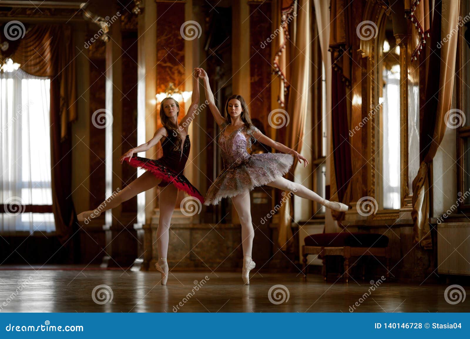 Two Beautiful Ballerinas Dancing in a Luxurious Hall Stock Photo ...