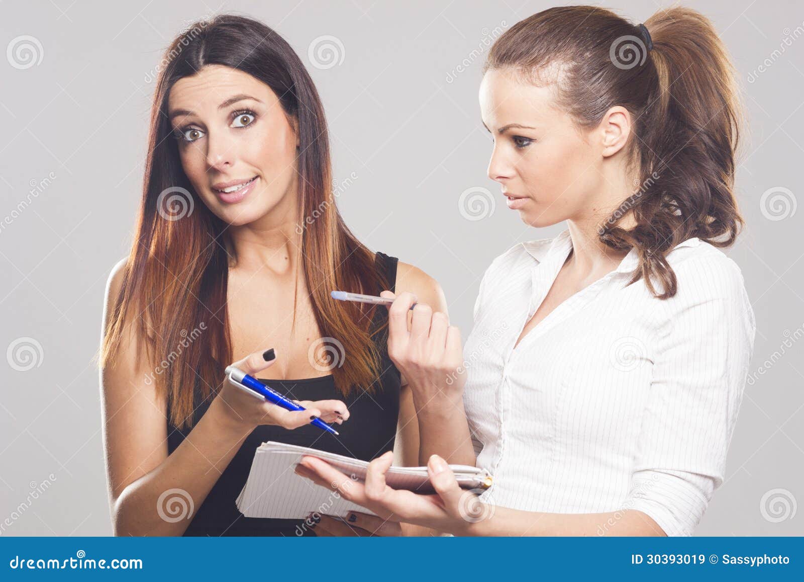 Two Beautiful Businesswoman Discussing Stock Image - Image of meeting ...