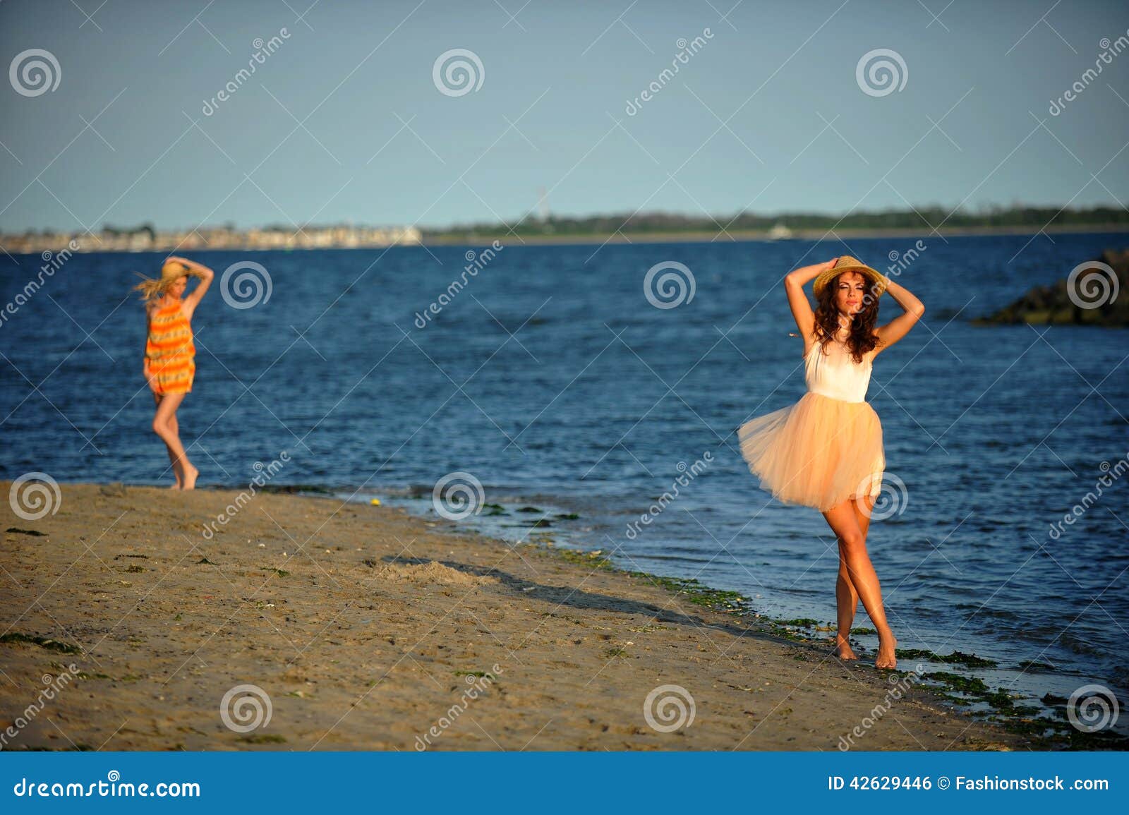 Two Beautiful Fashion Models Enjoy the Beach Stock Photo - Image of ...