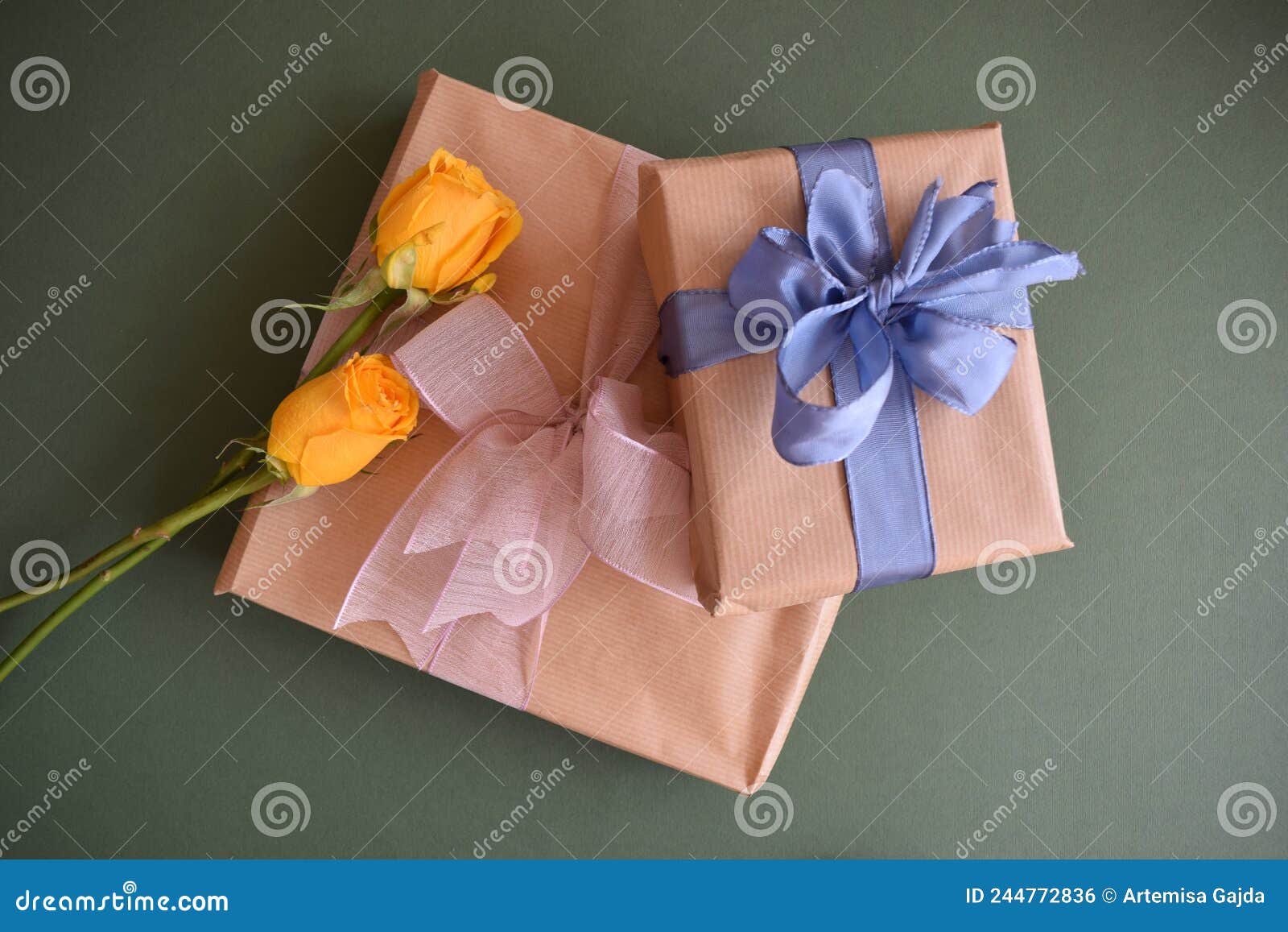 Two Beautiful Gifts and Two Yellow Roses Stock Photo - Image of rose ...