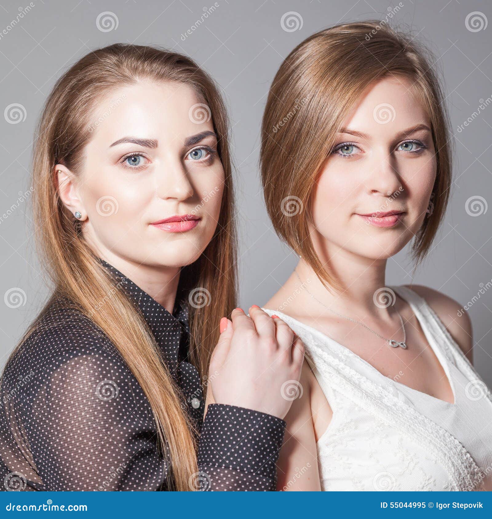 Two Beautiful Girlfriends Posing in the Studio Stock Image - Image of ...