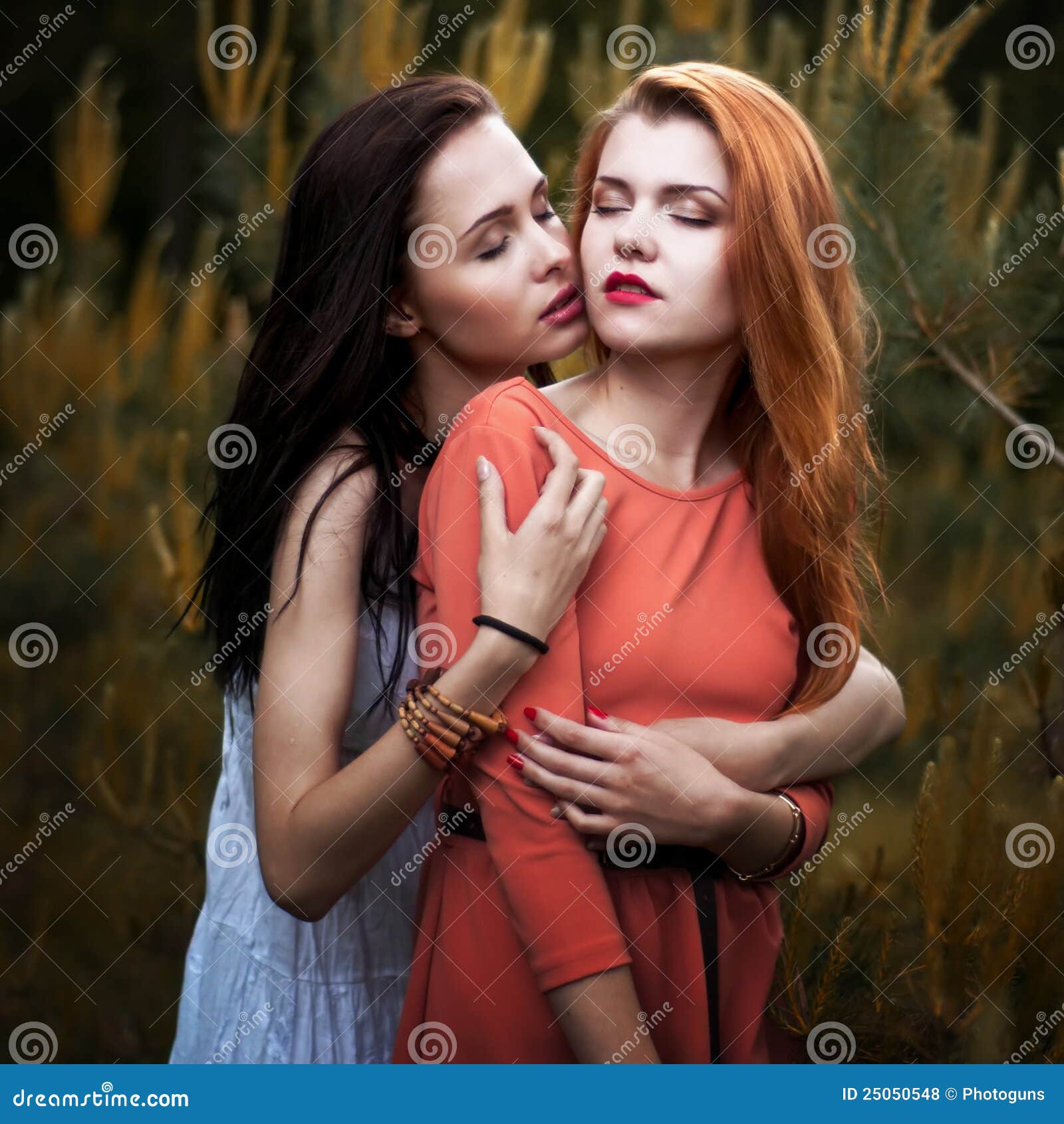 Two Beautiful Girls in the Background of Spruce Fo Stock Photo - Image ...