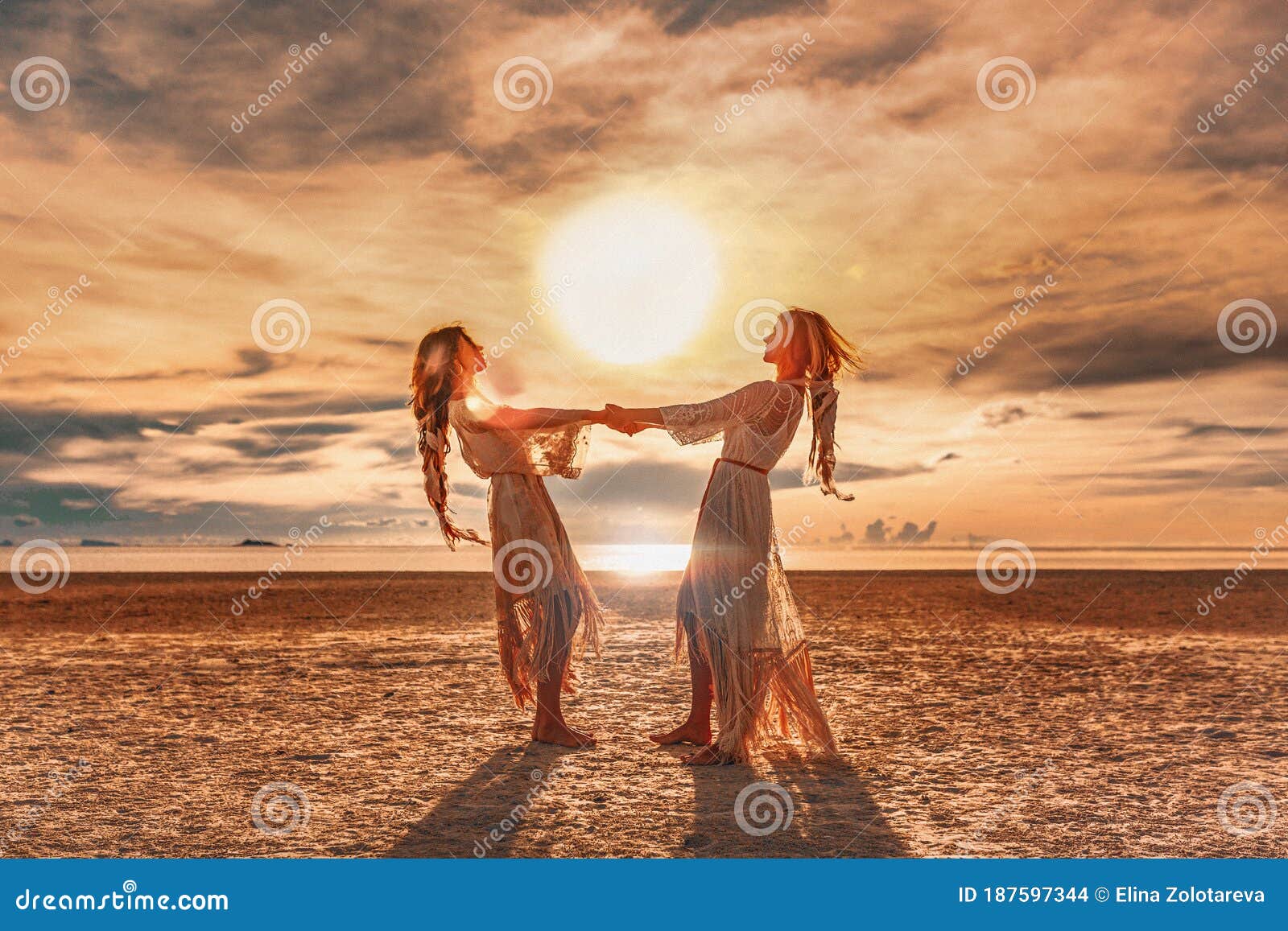 Two Beautiful Girls Having Fun at Sunset on the Beach Stock Photo ...