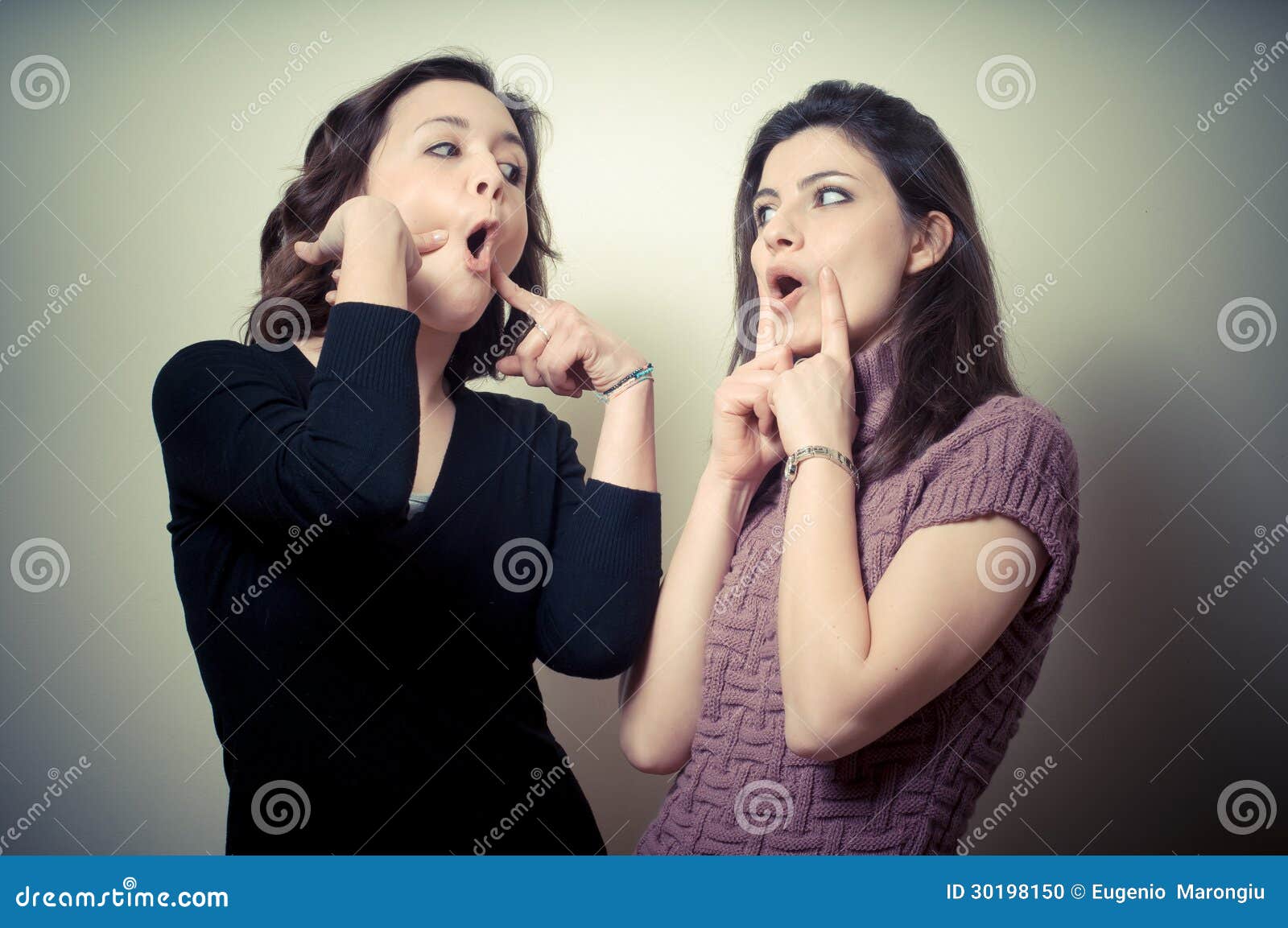 Two Beautiful Girls Playing Stock Photo - Image of beauty, friendship ...