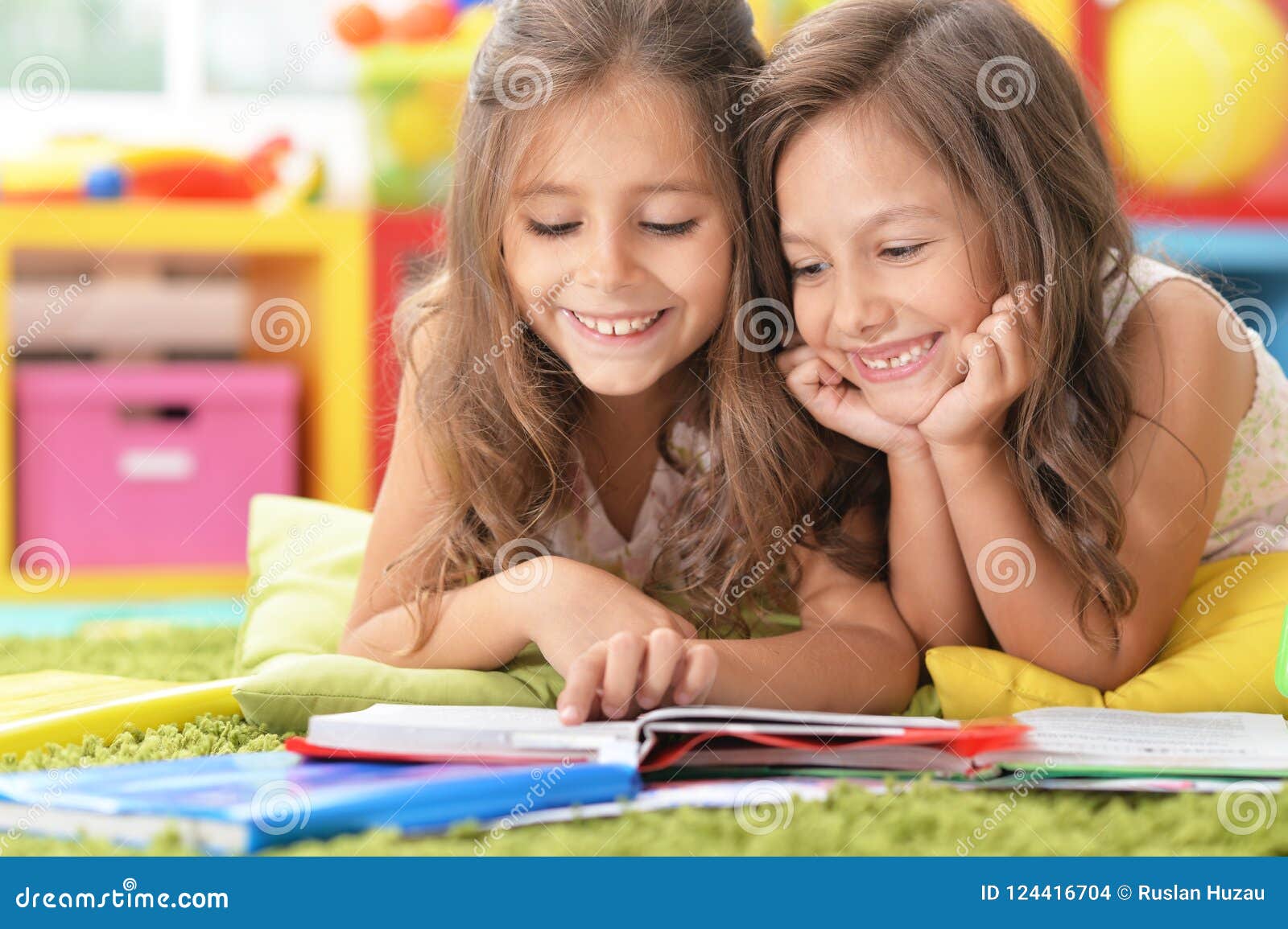 Portrait of Two Beautiful Little Girls Studying Stock Photo - Image of ...
