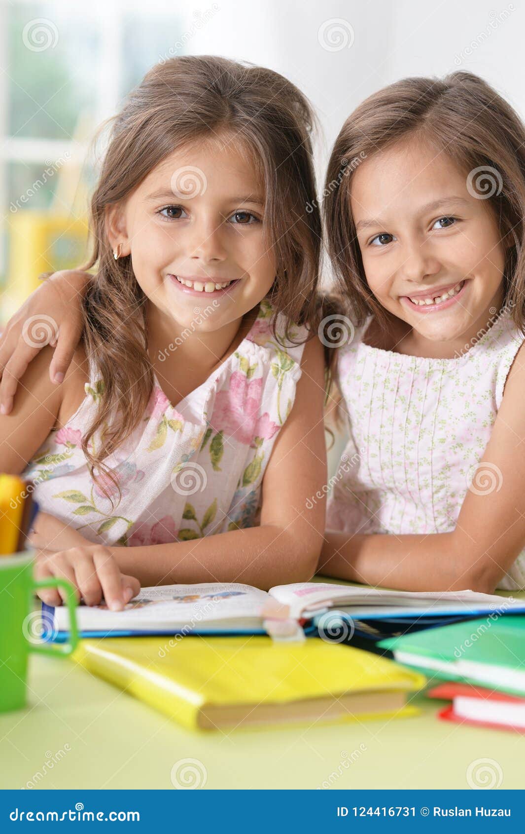 Portrait of Two Beautiful Little Girls Studying Stock Image - Image of ...