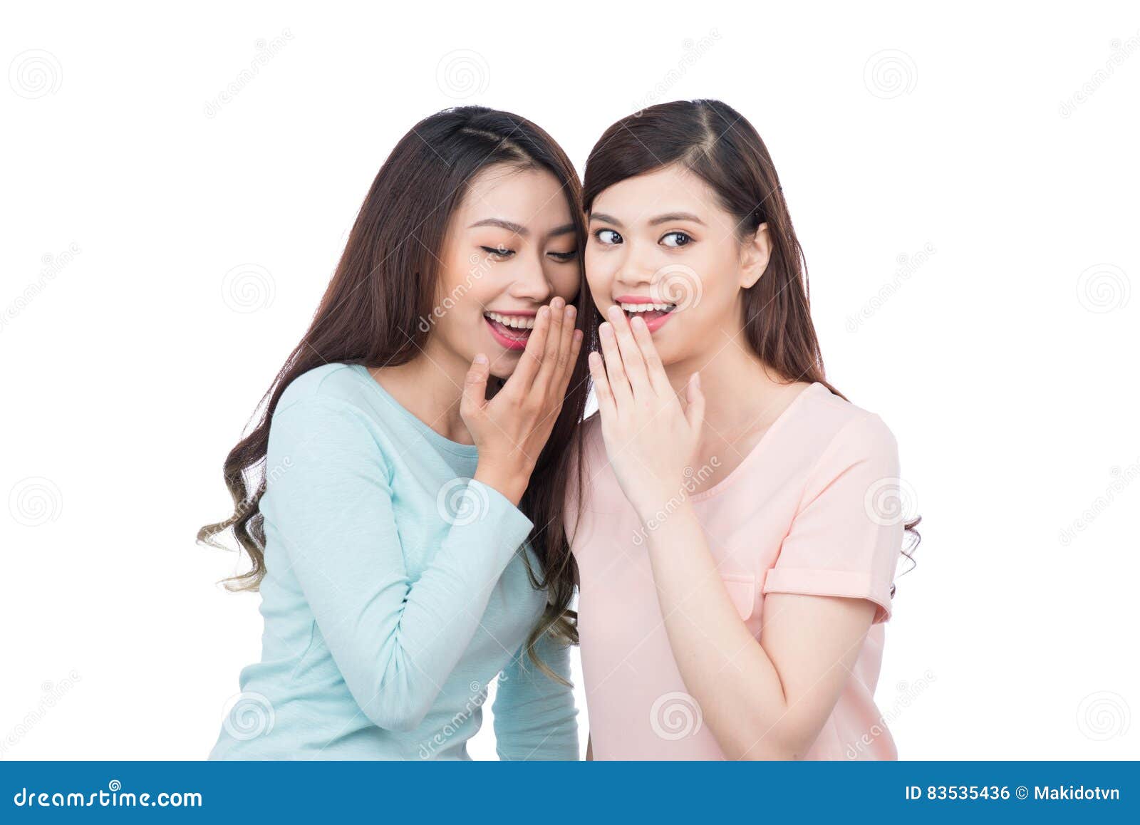 Two Beautiful Smiling Girls Sharing a Secret Stock Photo - Image of ...