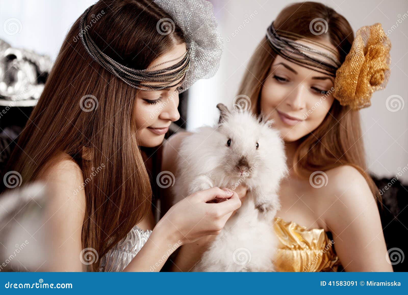 Two Beautiful Stylish Girls with a Rabbit Stock Image - Image of cute ...