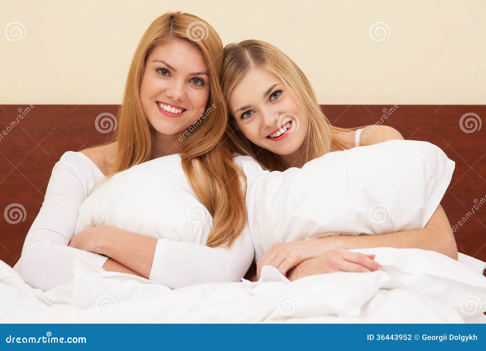 Two beautiful women in bed stock photo. Image of beauty - 36443952