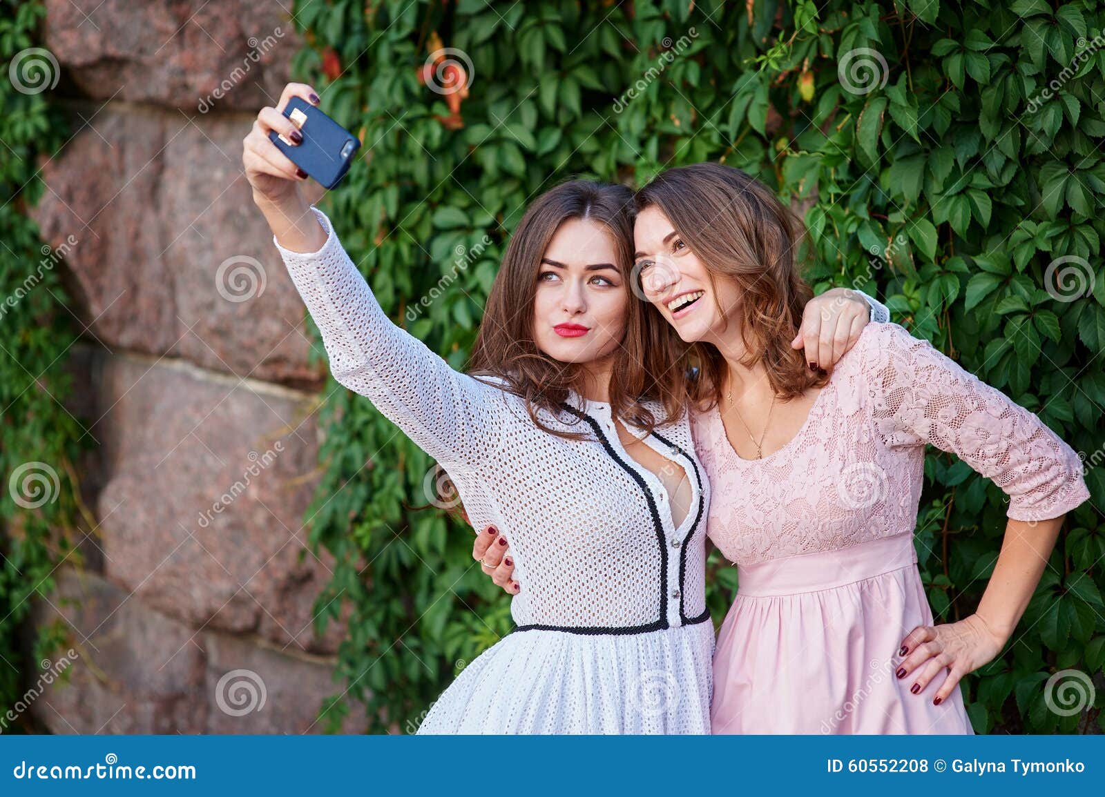 Two Beautiful Women Doing Selfe Stock Photo - Image of mobile, selfie ...