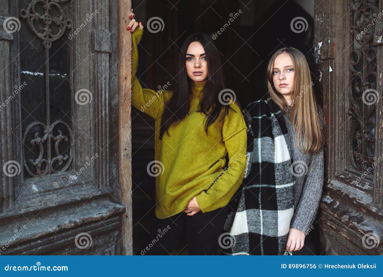 Two Beautiful Women Near the Old Doors Stock Photo - Image of beautiful ...