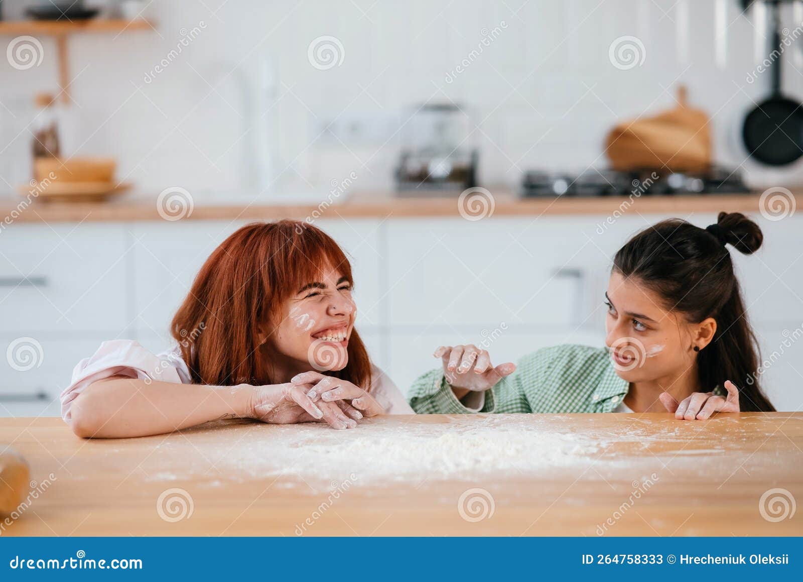 Two Beautiful Women Play with Flour in the Kitchen Stock Image - Image ...
