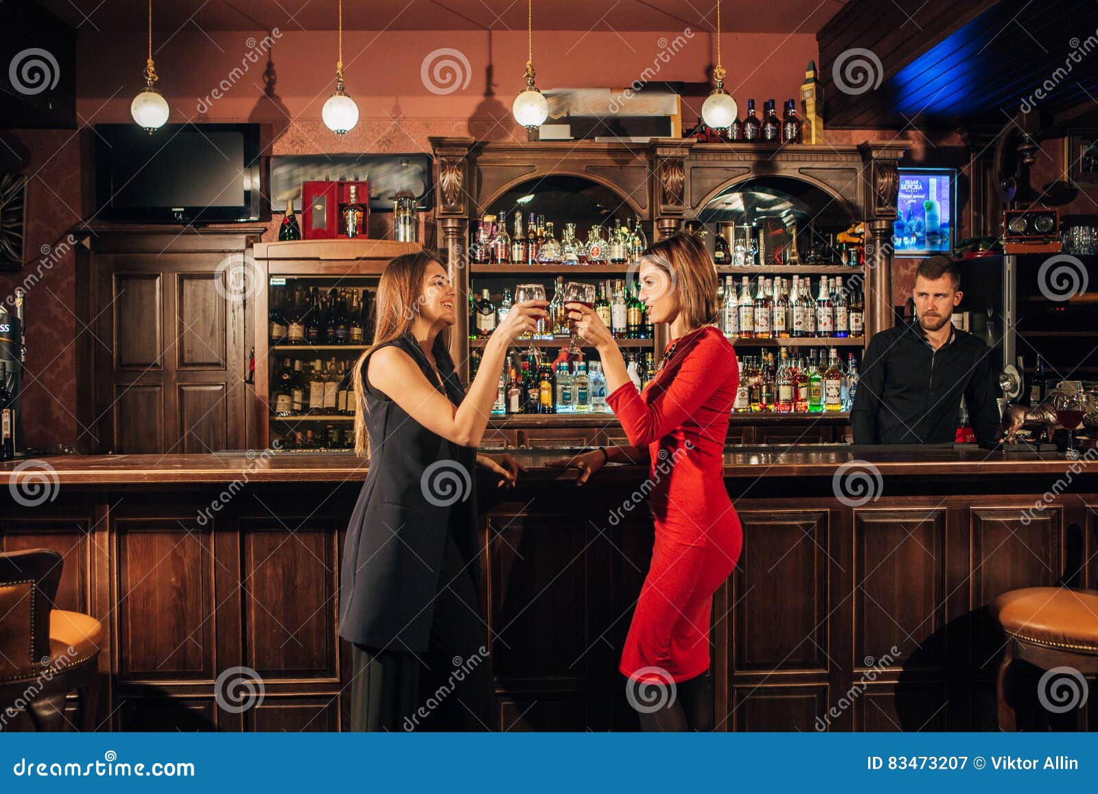 Two Beautiful Women are Relaxing in the Bar Stock Image - Image of ...