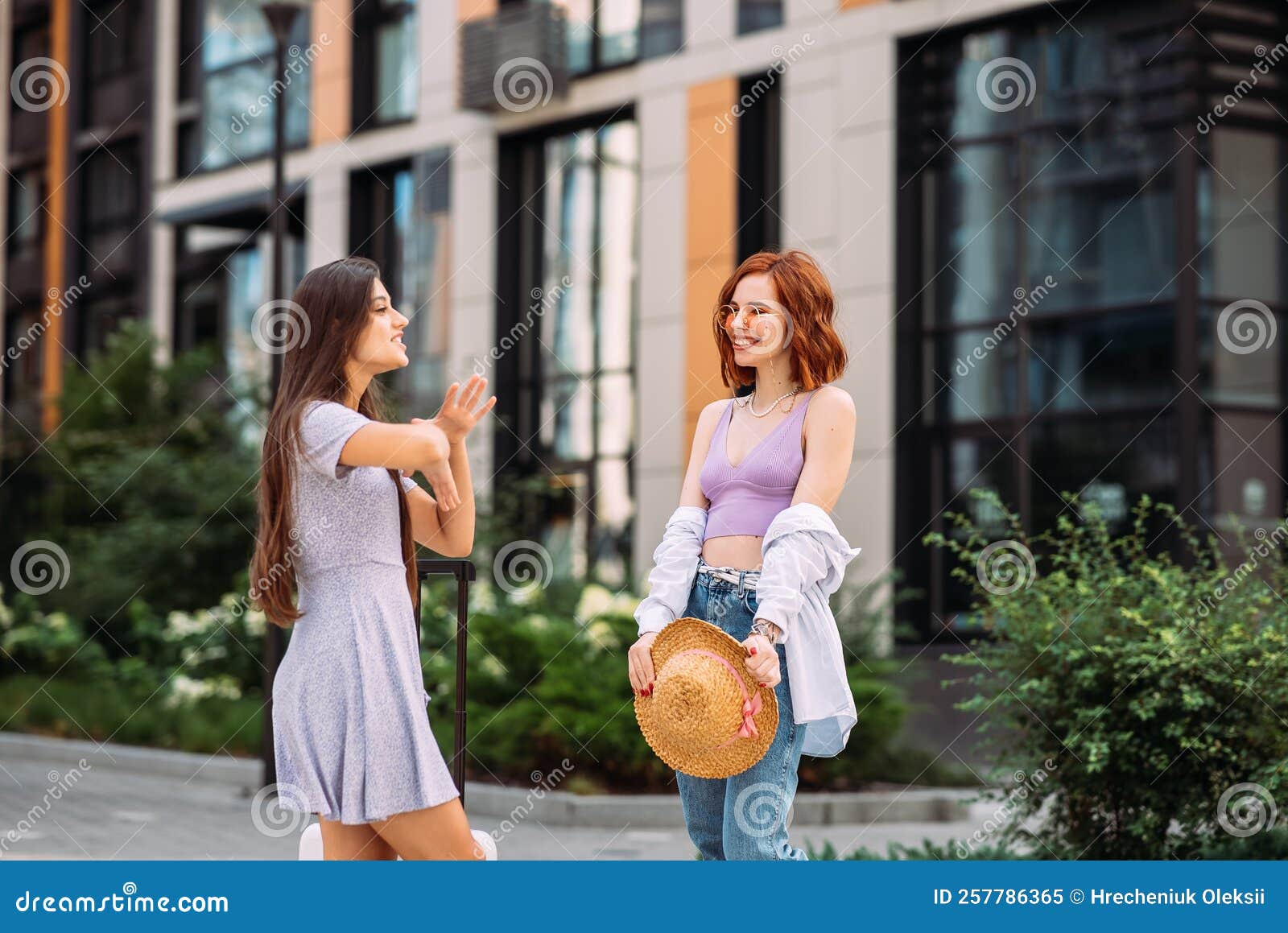 Two Beautiful Women Talking and Standing Outdoors Stock Image - Image ...