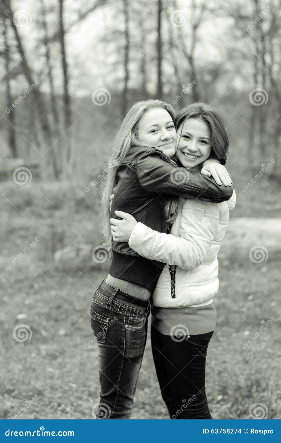 Two Beautiful Young Girls Hugging in the Spring Stock Photo - Image of ...