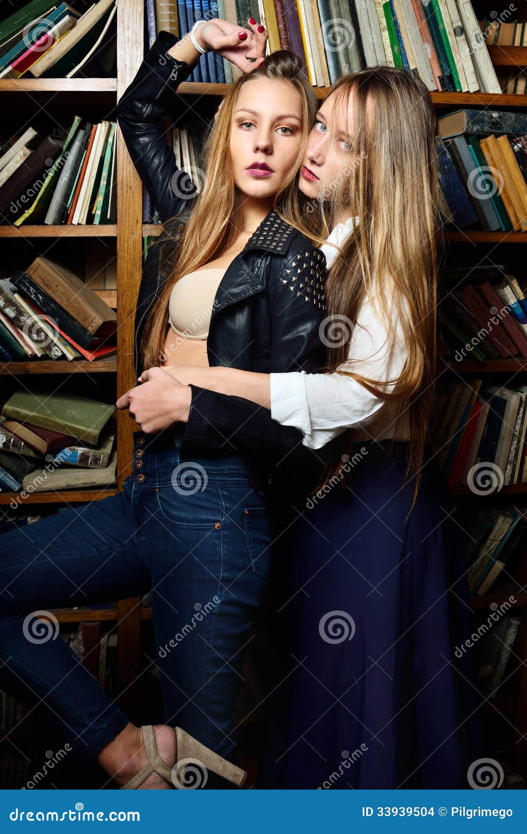 Two Beautiul Women Holding in the Library Stock Photo - Image of room ...