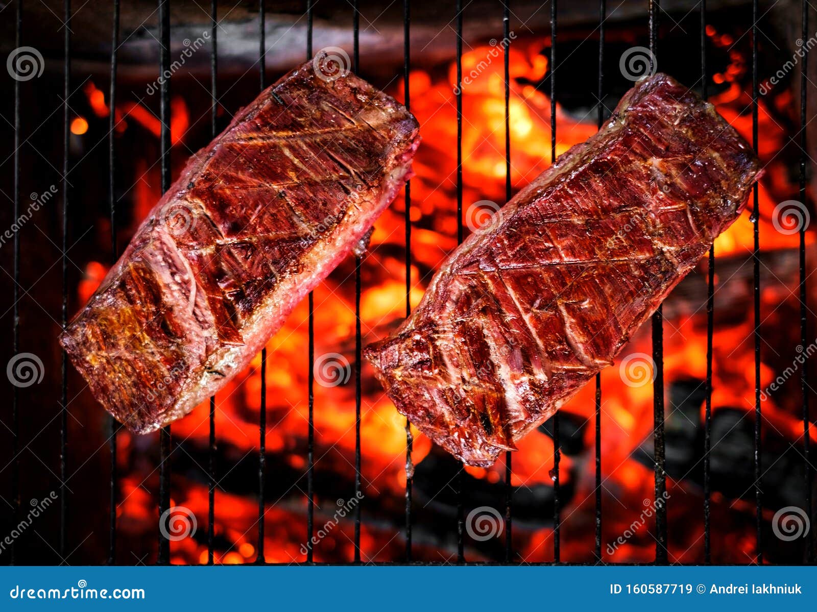 Two beef steak on grill stock image. Image of barbeque - 160587719