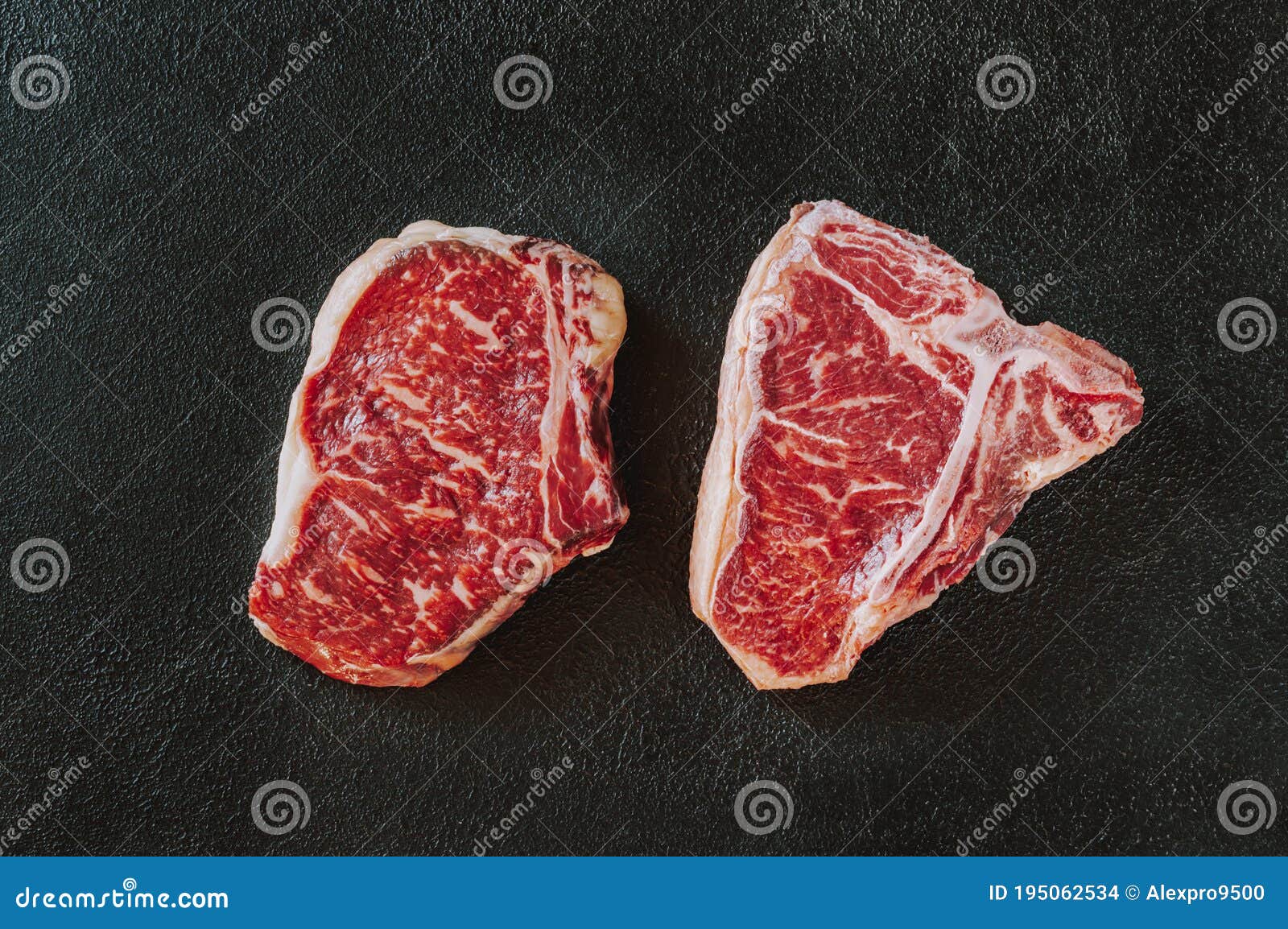 Two beef steaks stock photo. Image of angus, board, meat - 195062534